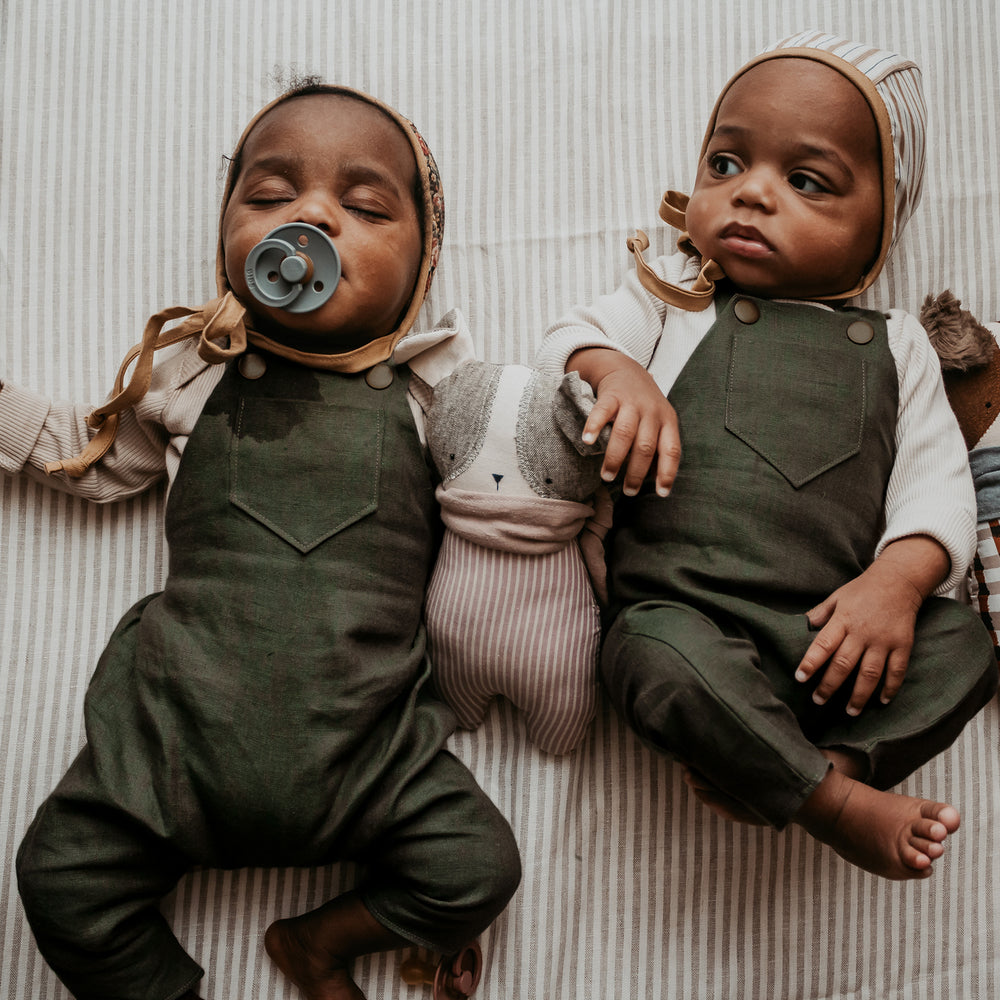 Dark Green grow-with-me organic baby and toddler overalls from Beya Made